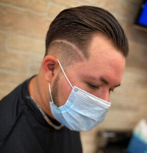 11 Sophisticated Slick Back Haircut with Fade to Try in 2024