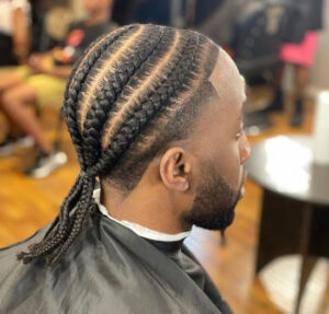 16 Fashionable Taper Fade with Braids for Men in 2024